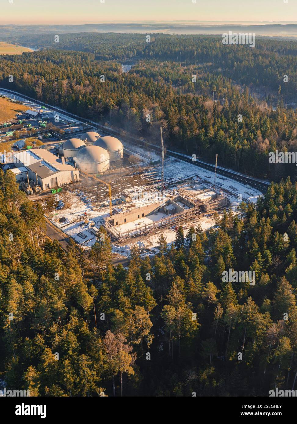 Bird's eye view of industrial building and construction site in the ...