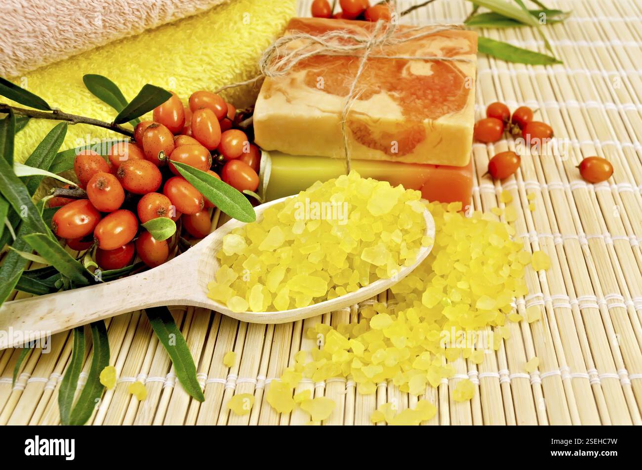 Bath salts and yellow and two bars of homemade soap, twigs and berries ...