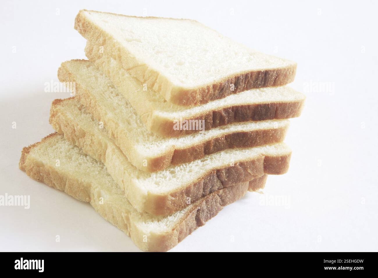Slices of dabal roti bread dough made from flour yeast and milk on ...