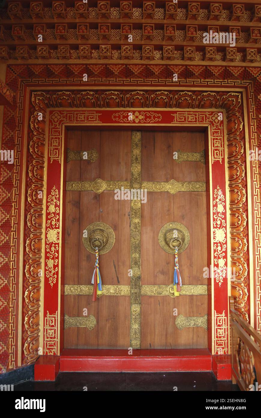 Decorated wooden gate of vajra vidya vihar temple, Sarnath, Varanasi ...