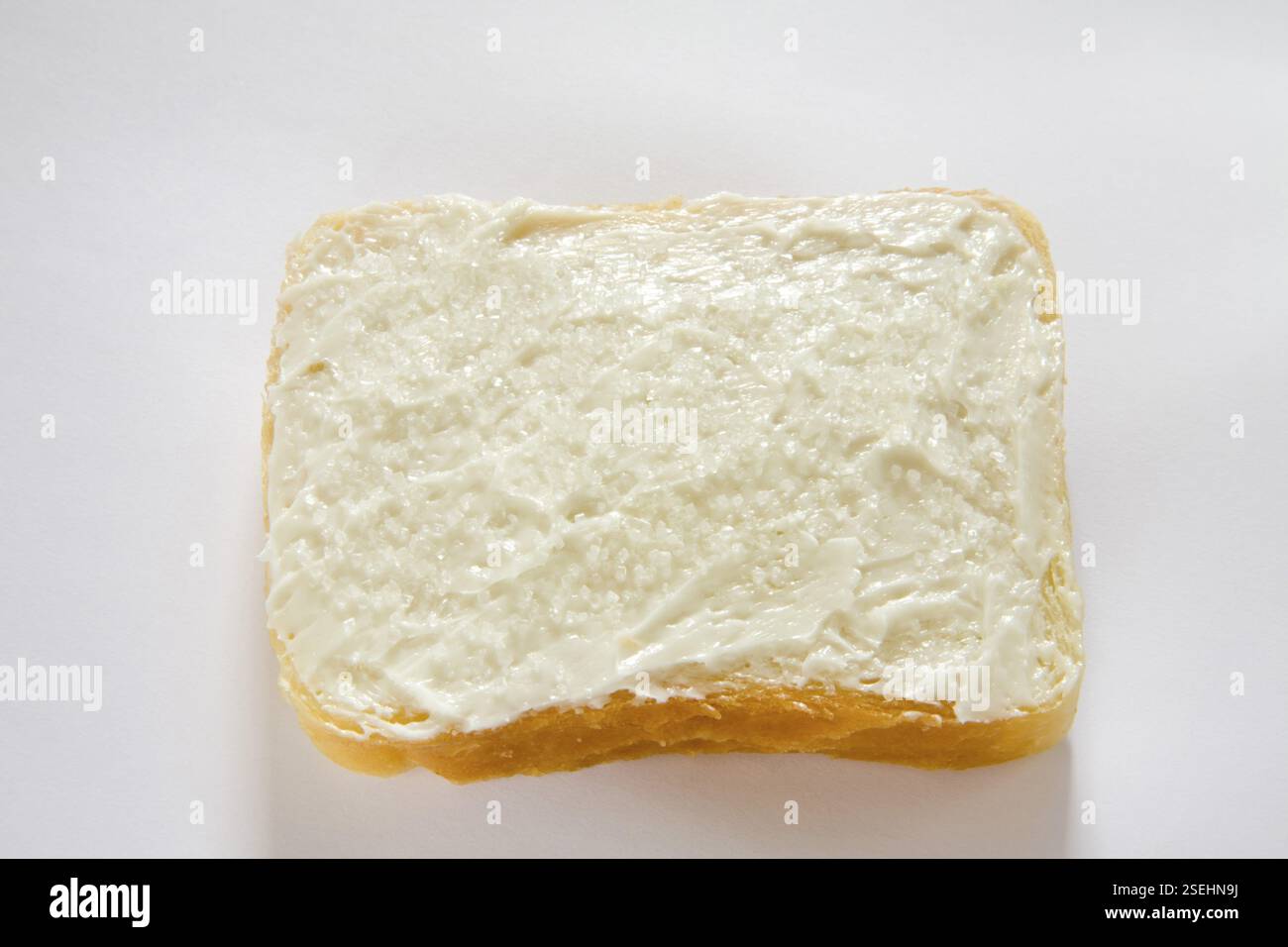 Breakfast food, butter applied on single slice of bread Stock Photo - Alamy