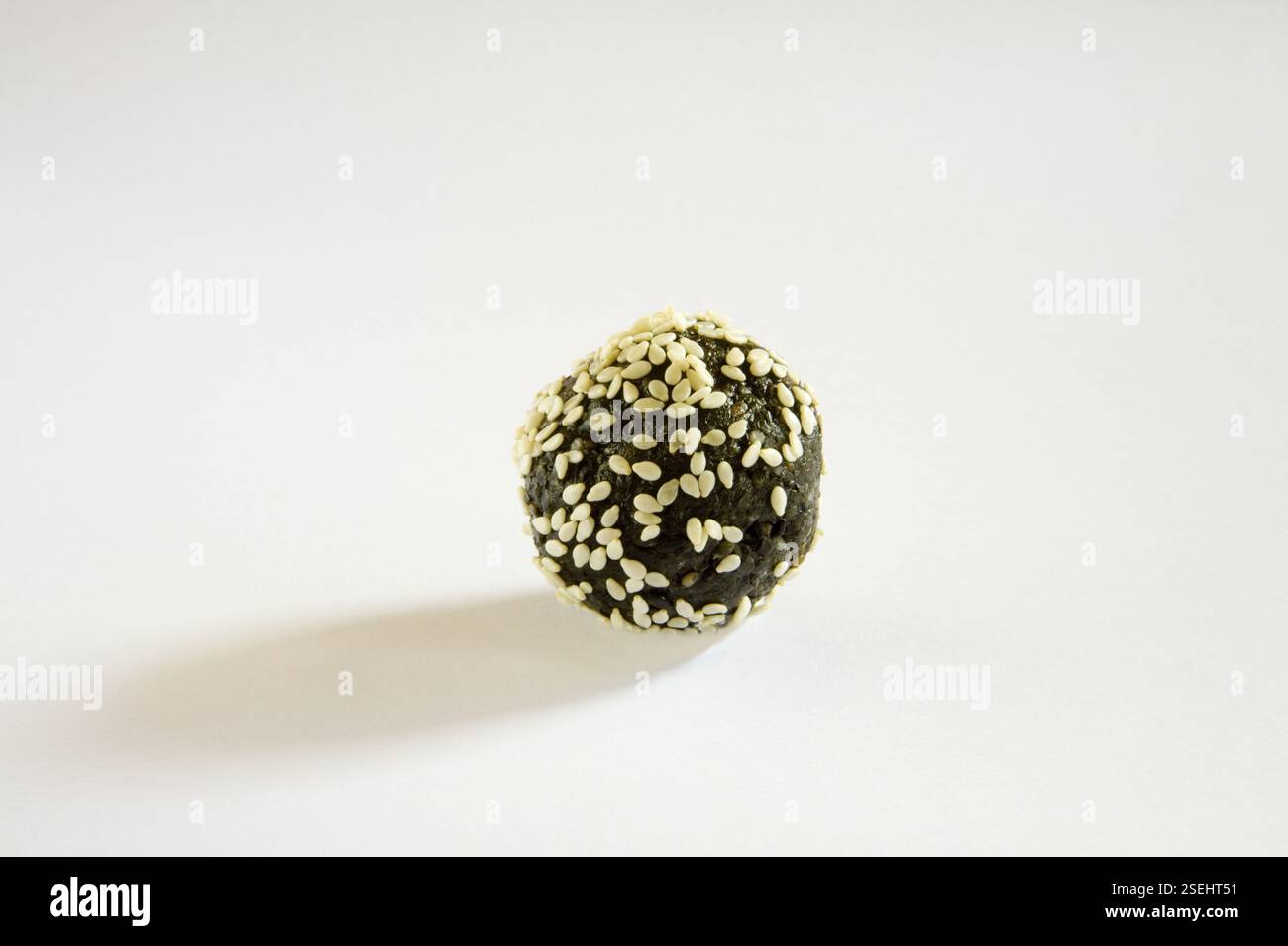 Cuisine sesame sweet ball till Ka laddoos made with jaggery sesamum ...
