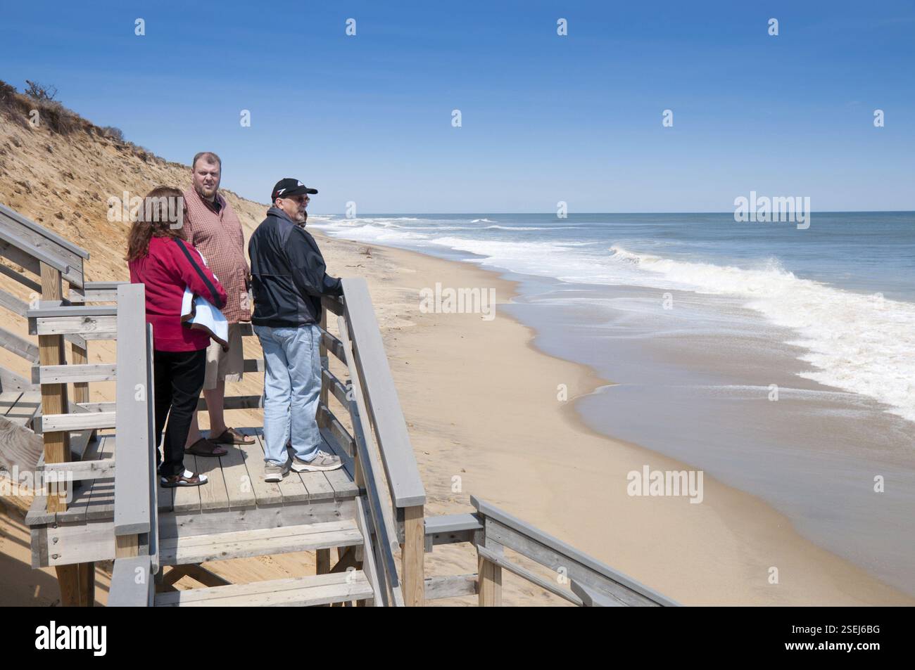 People watching the ocean at stairs of Marconi Beach, Cape Cod ...