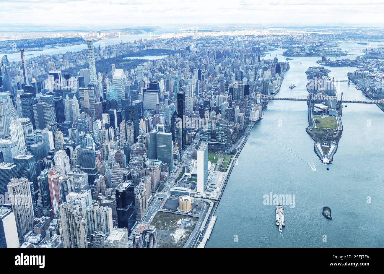 Aerial view of Manhattan buildings and Roosevelt Island on the East ...