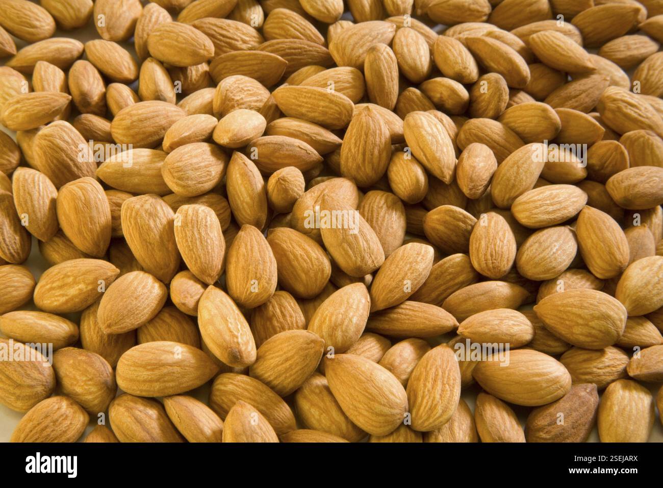 Dry fruit, whole Almonds nuts Badam Prunus dulcis Stock Photo - Alamy