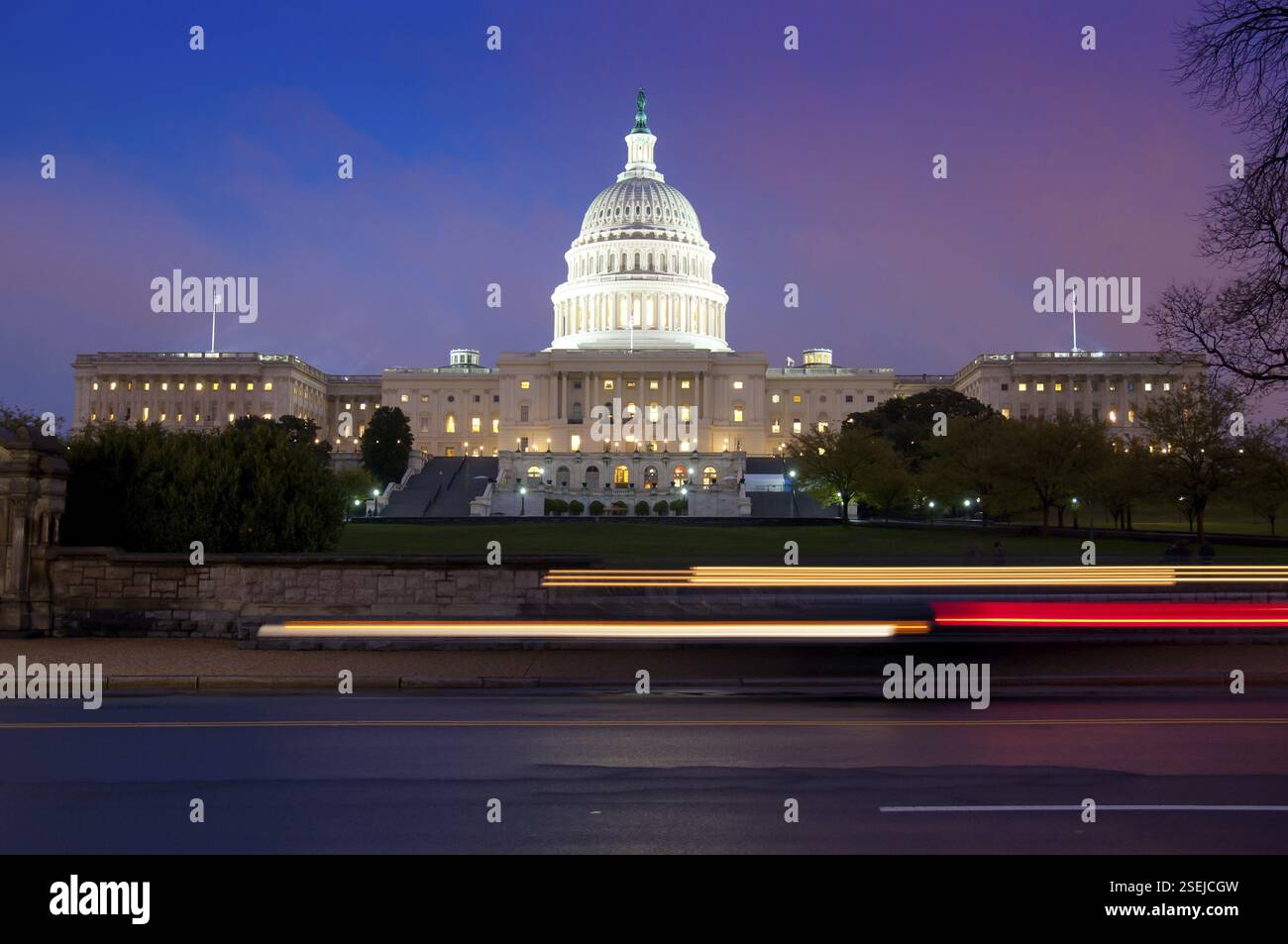The US Congress House (Capitol) at night with light streaks from cars ...