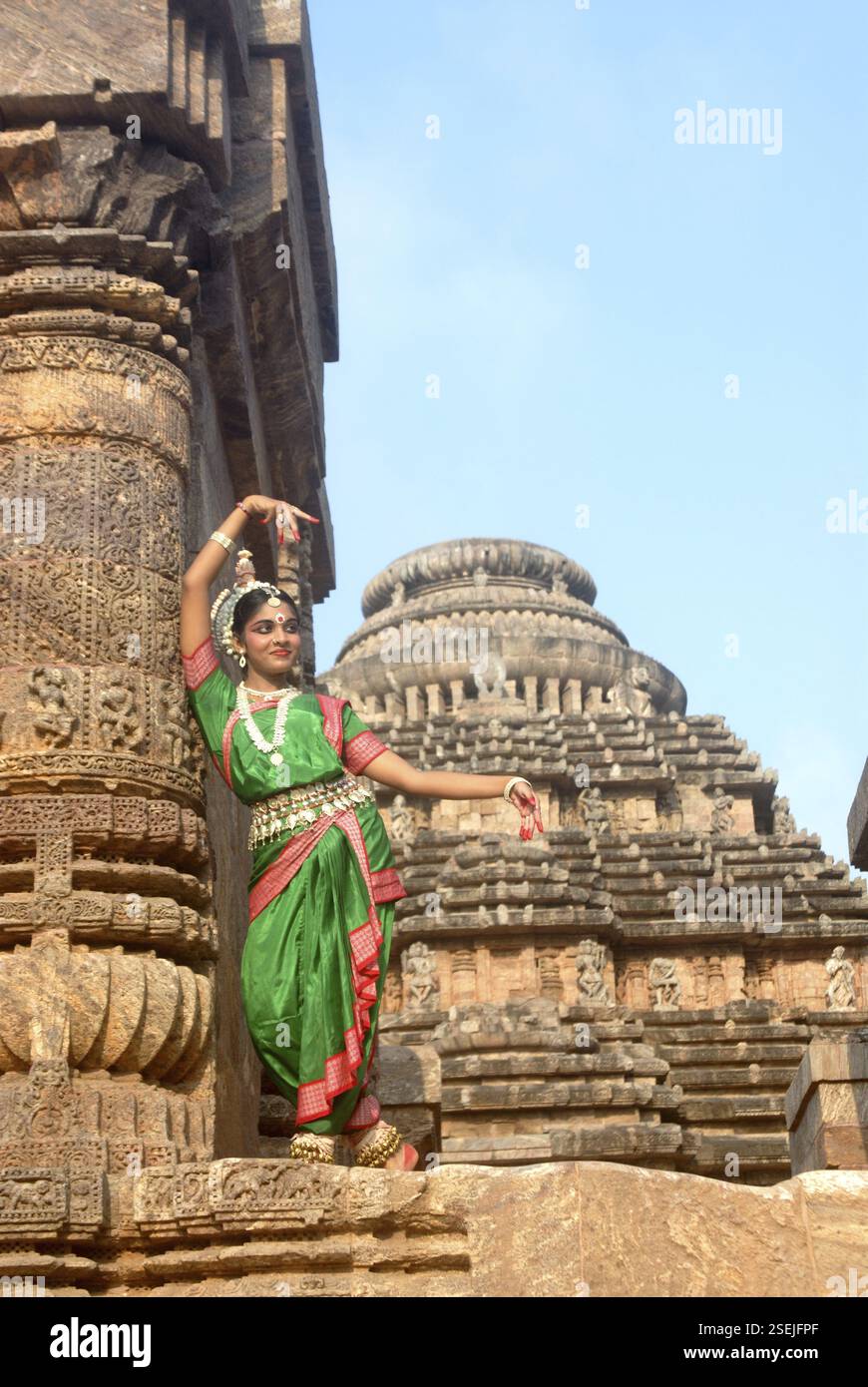 Dancer performing classical traditional odissi dance at Konarak Sun temple, Konarak, Orissa ...