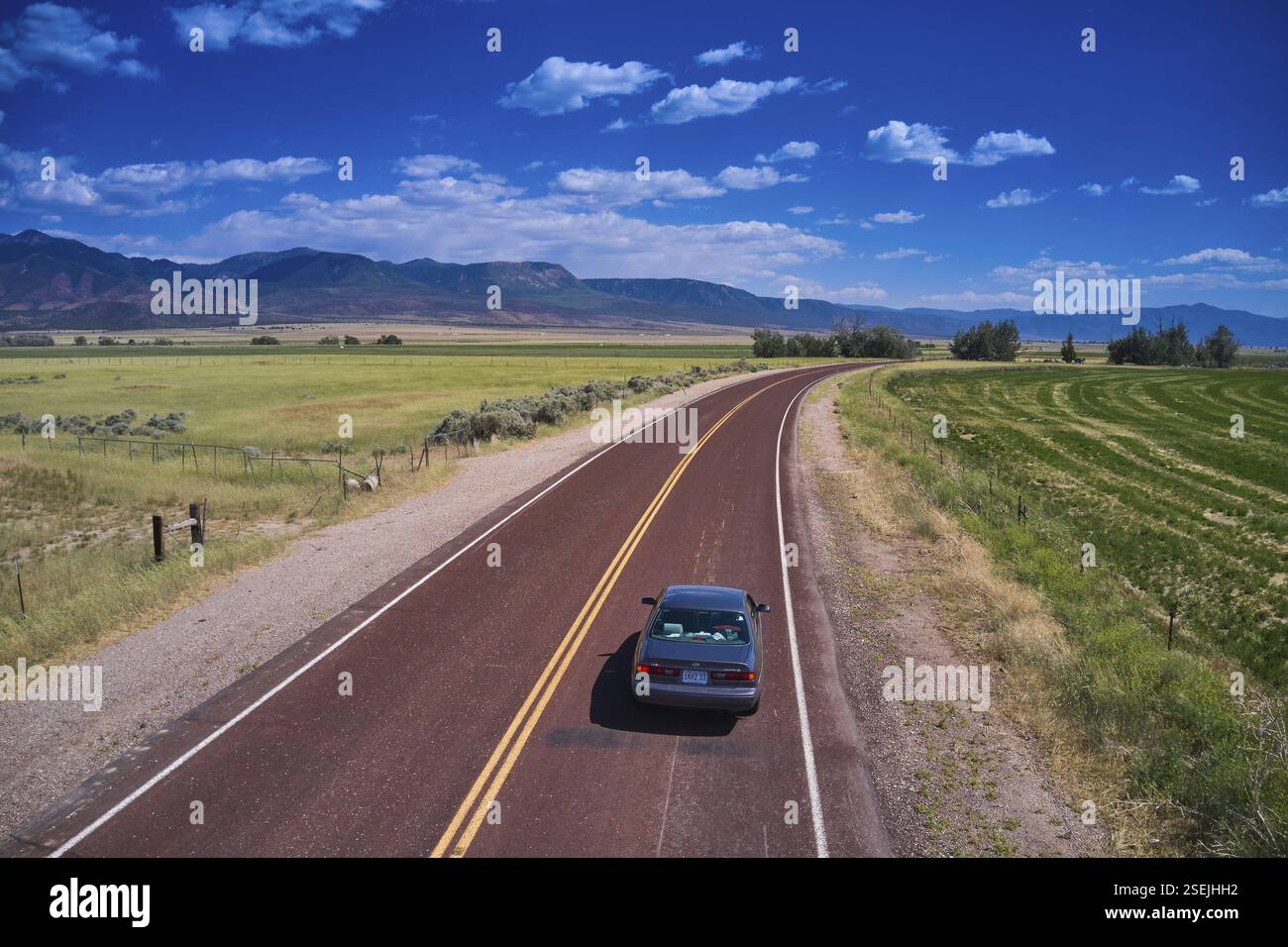 Car driving on an empty state road in rural area of the USA, USA, North ...