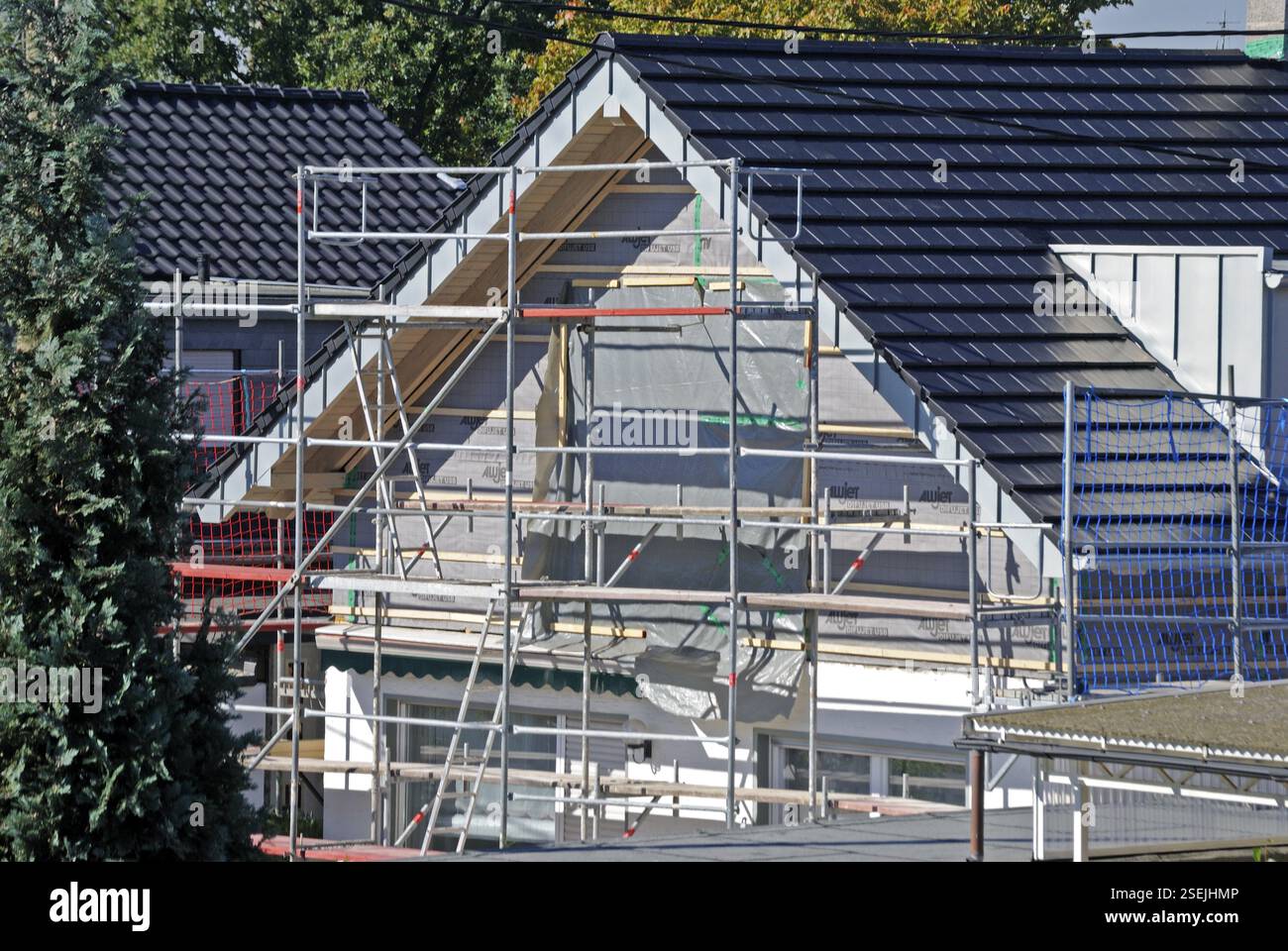 Residential building, renovation, roof redesign Stock Photo - Alamy