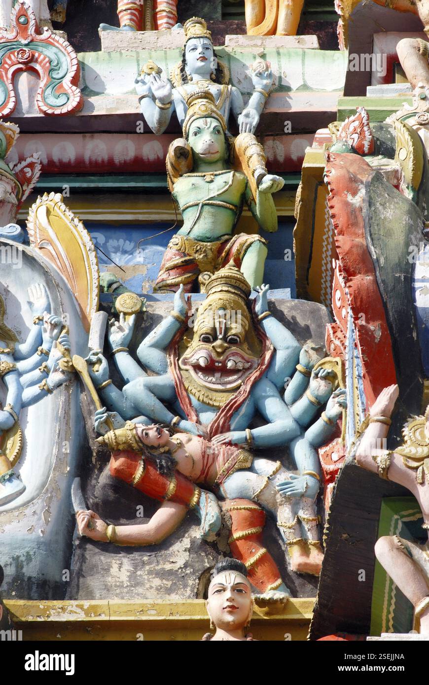 Deity Narasingha killing demon Hiranyashasipu on gopuram of Sri ...