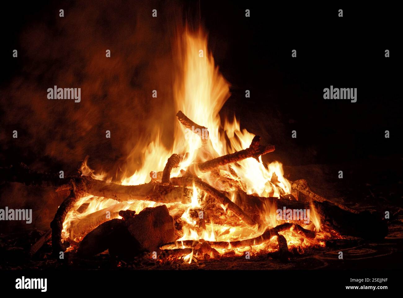 Huge bonfire burning wood fire ignited to celebrate Holi festival ...