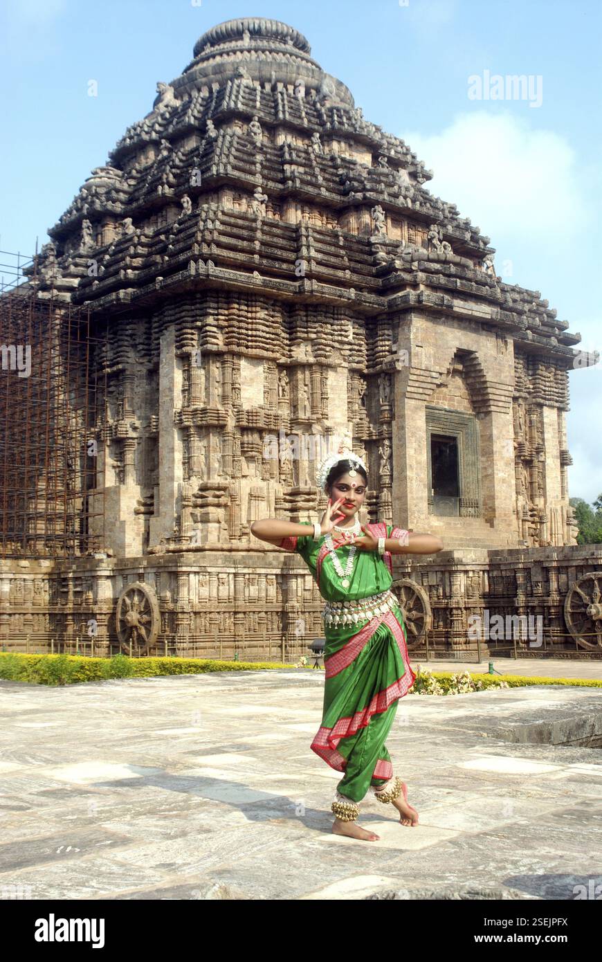 Dancer performing classical traditional odissi dance at Konarak Sun temple, Konarak, Orissa ...