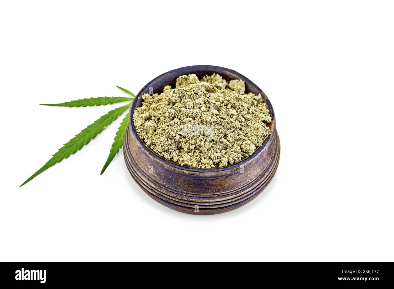Hemp flour in a bowl, cannabis leaf isolated on white background Stock ...