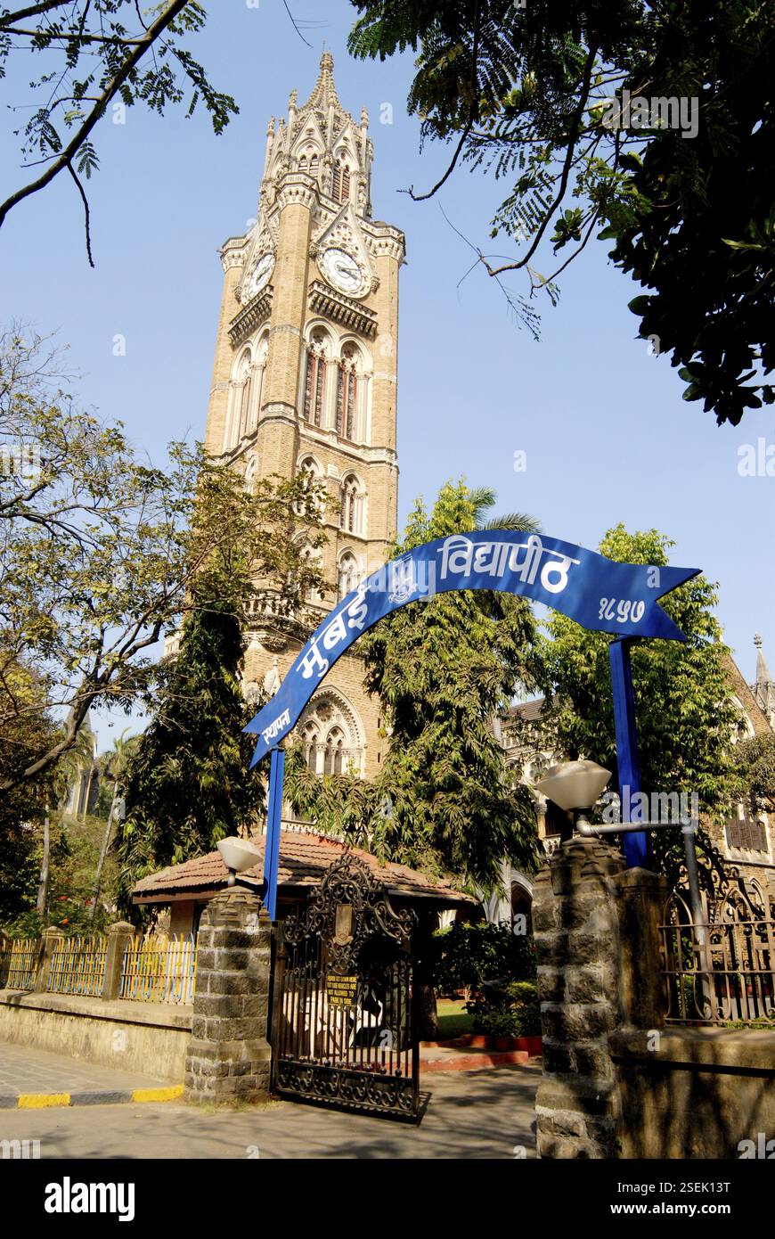 Rajabai tower clock tower with board of University of Mumbai, Bombay ...