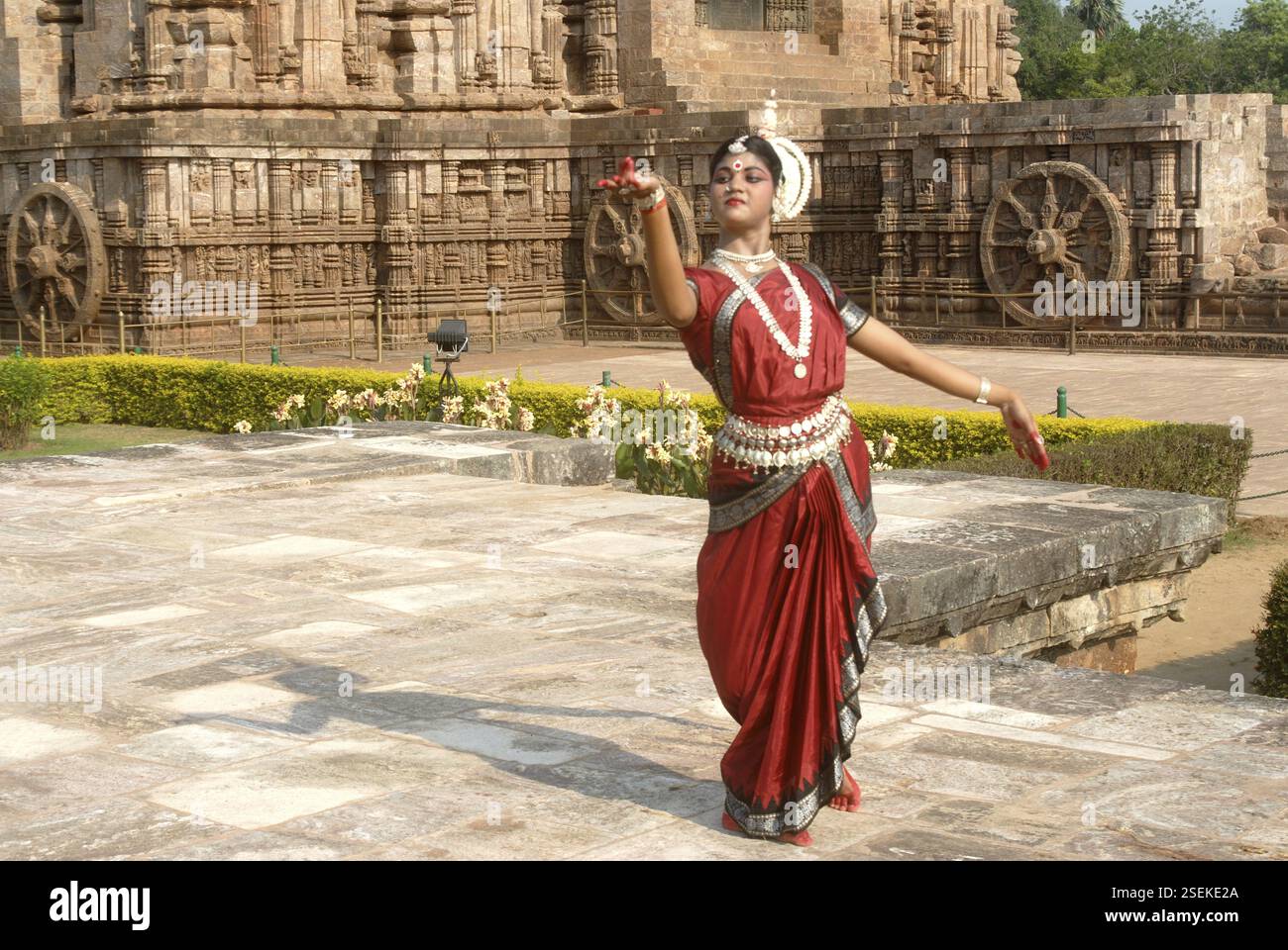 Dancer performing classical traditional odissi dance at Konarak Sun temple, Konarak, Orissa ...