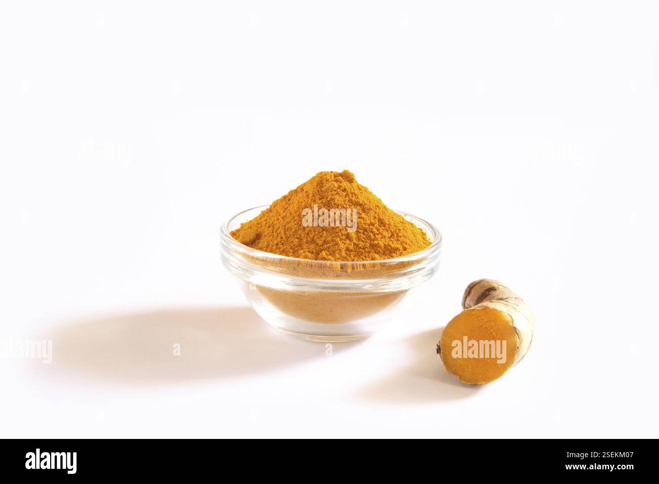 Indian spice, fresh Turmeric and powder Haldi Curcuma Longa on white ...