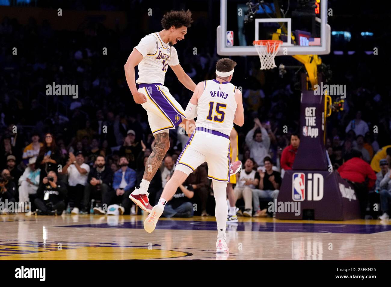 Los Angeles Lakers guard Austin Reaves, right, celebrates with center ...