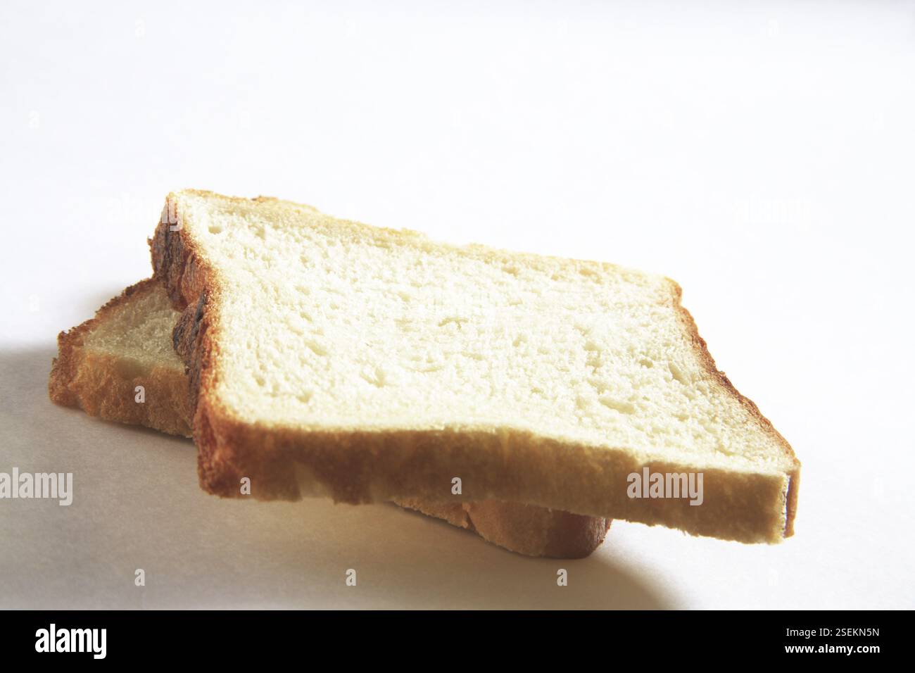 Slices of dabal roti bread dough made from flour yeast and milk on ...