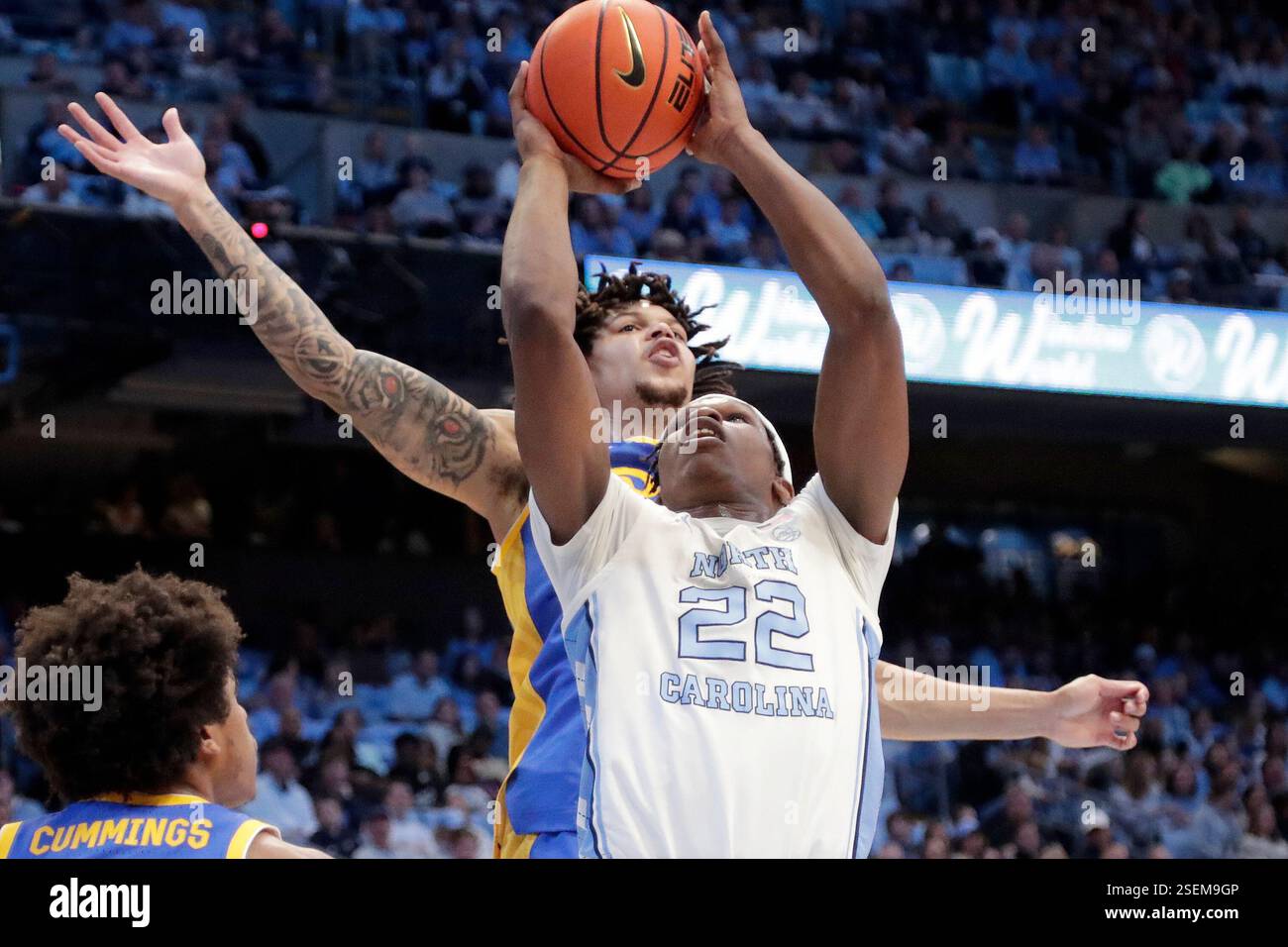 North Carolina forward Ven-Allen Lubin (22) attempts to shoot as he is ...