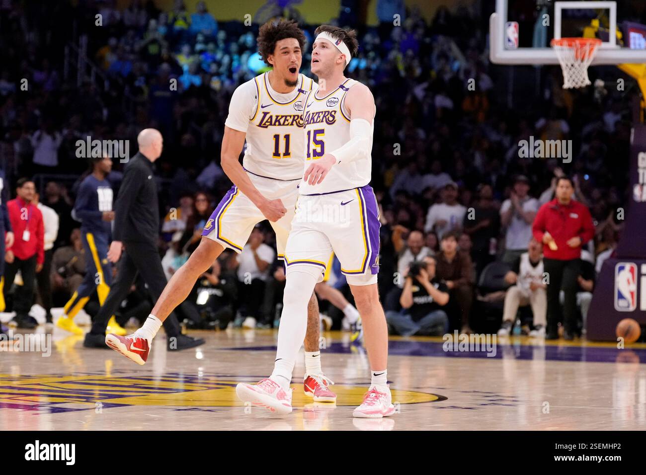 Los Angeles Lakers guard Austin Reaves, right, celebrates with center ...