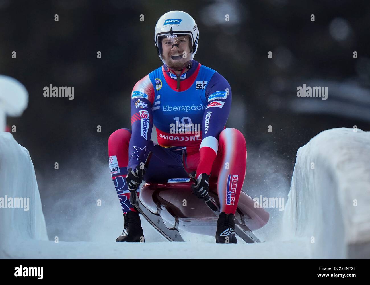 Jonathan Eric Gustafson, of the U.S., comes to a stop after racing to ...