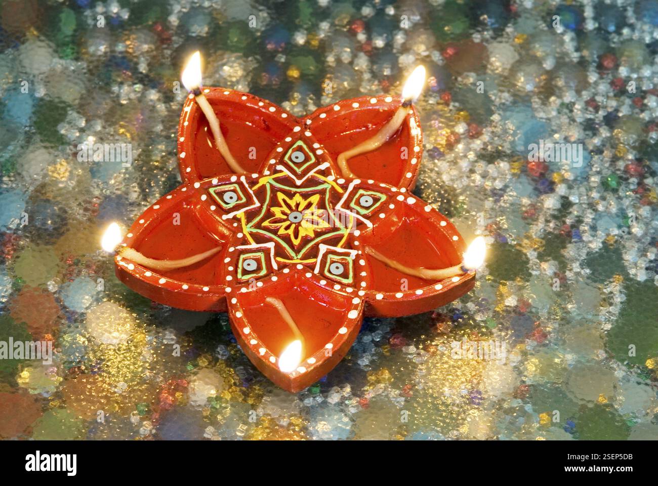 Oil lamp adorned hi-res stock photography and images - Alamy