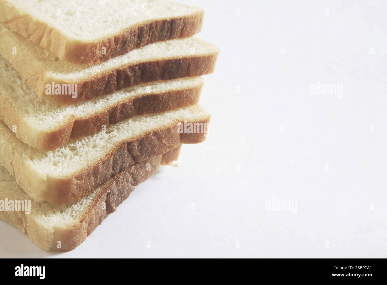 Slices of dabal roti bread dough made from flour yeast and milk on ...
