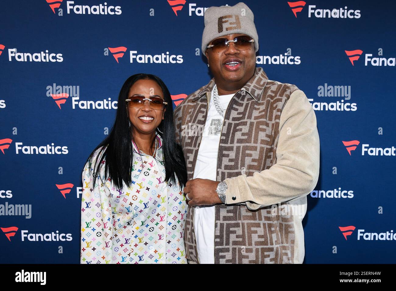 New Orleans, USA. 08th Feb, 2025. Tracy Stevens and E-40 walking the ...