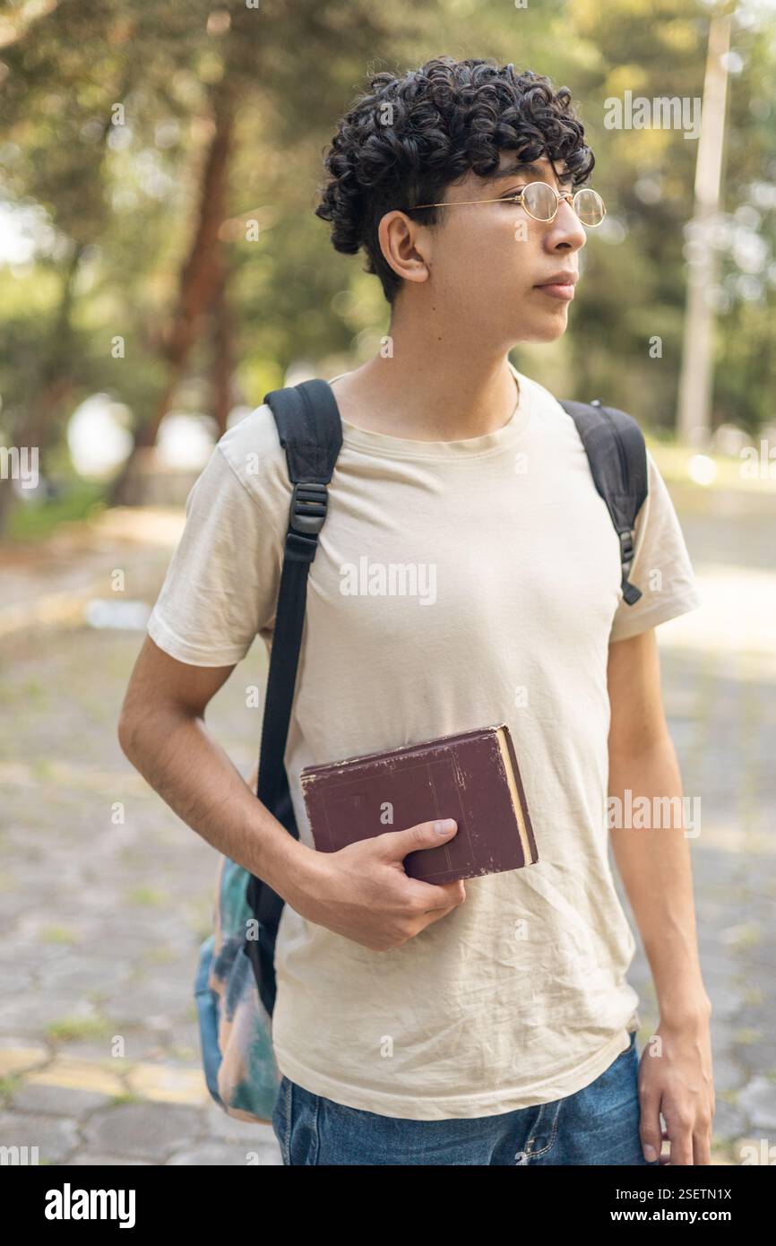 Jehovah's Witness holding a Bible in their hands, focused and ready to ...