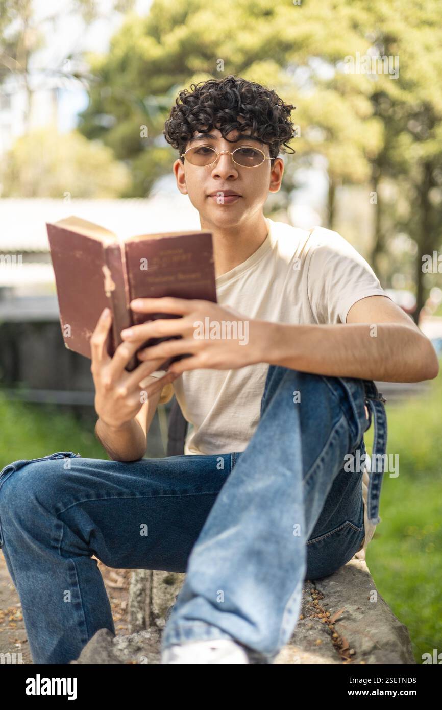 A person reading a book on learning to love, exploring self-growth and ...