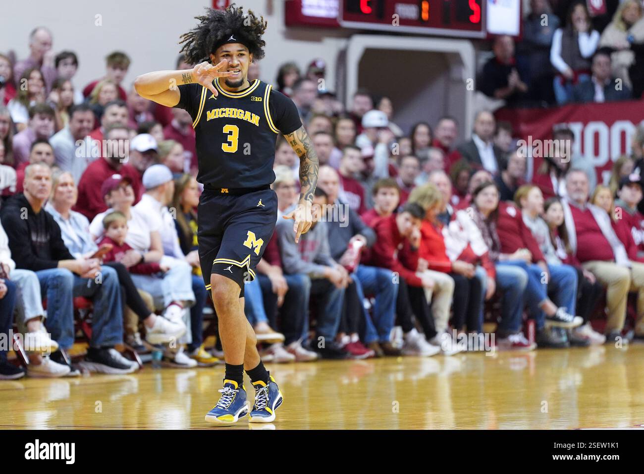 Michigan's Tre Donaldson reacts after scoring a 3-point basket against ...