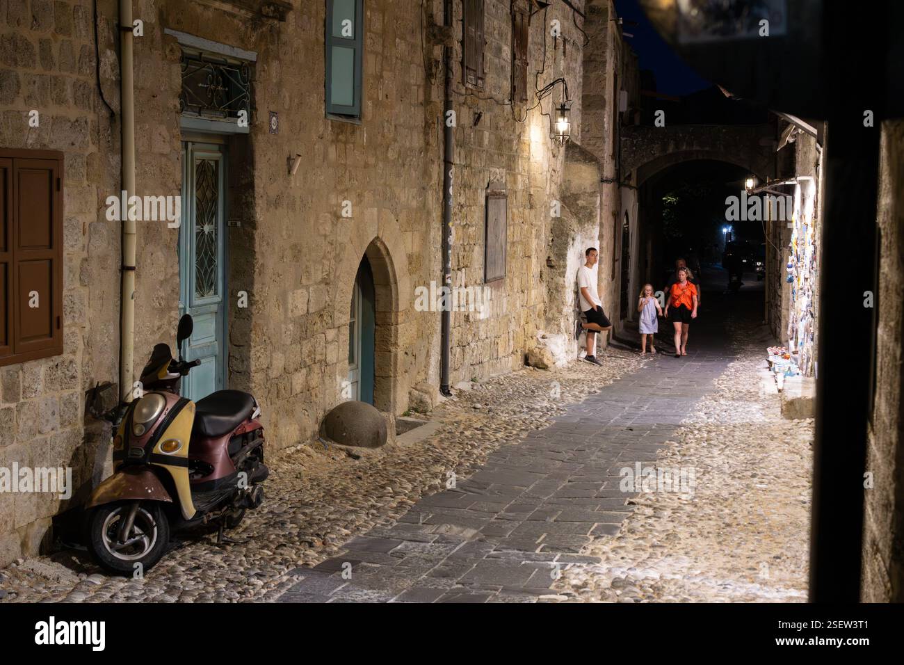 Rhodes, Greece - August 20 2024; Rhodes Old Town at night people out in ...