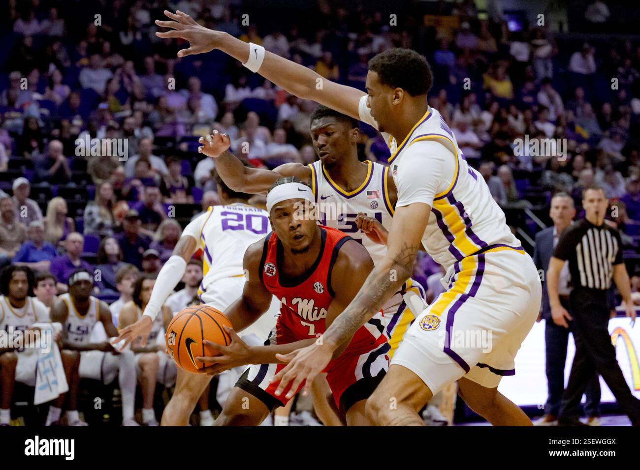 Mississippi guard Davon Barnes (7) looks to pass against LSU guard Cam ...