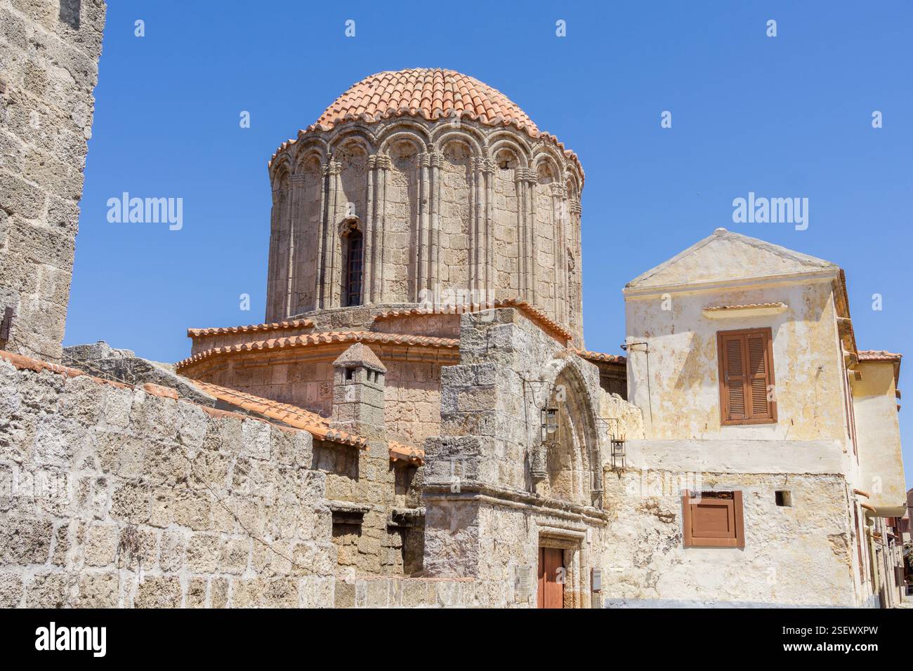 Tower and dome of St Georges Byzantine church in Old Town of Rhodes on ...