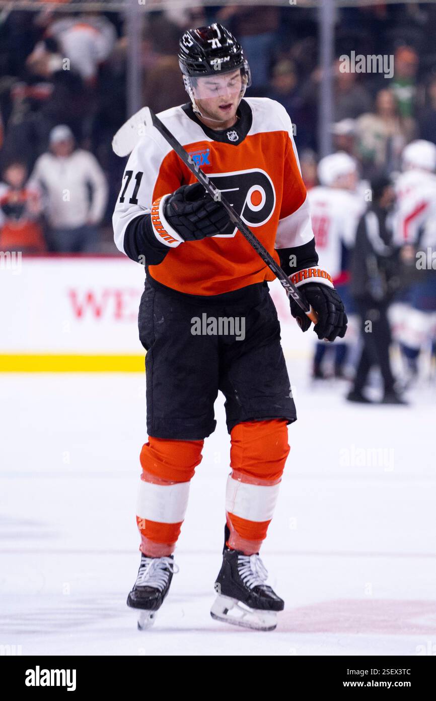 Philadelphia Flyers' Tyson Foerster, left, reacts to the lose as the ...