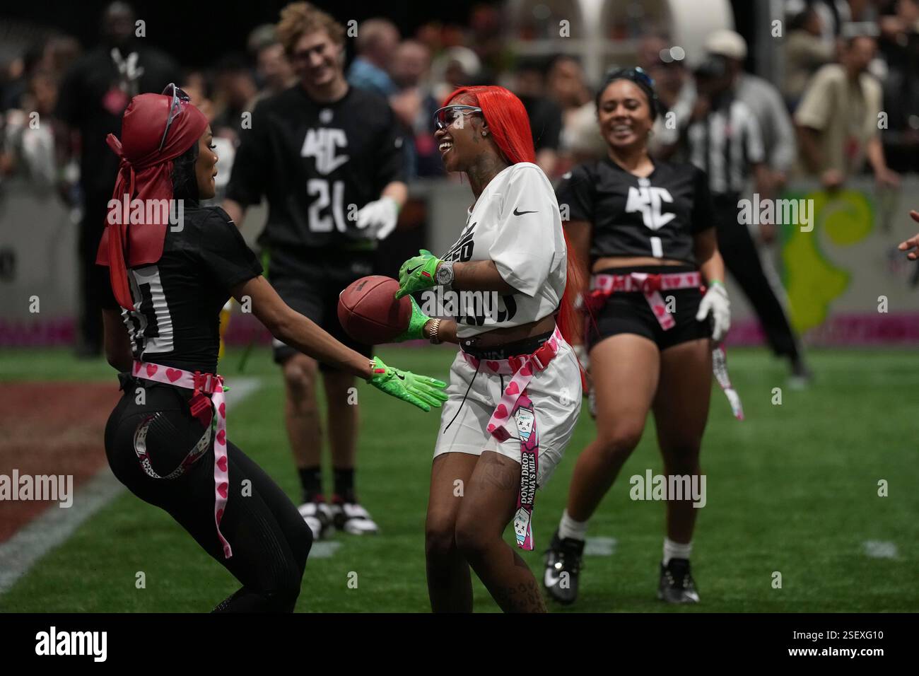 Team Speed's Sexyy Red, middle, runs against Team Kai's Teyana Taylor ...