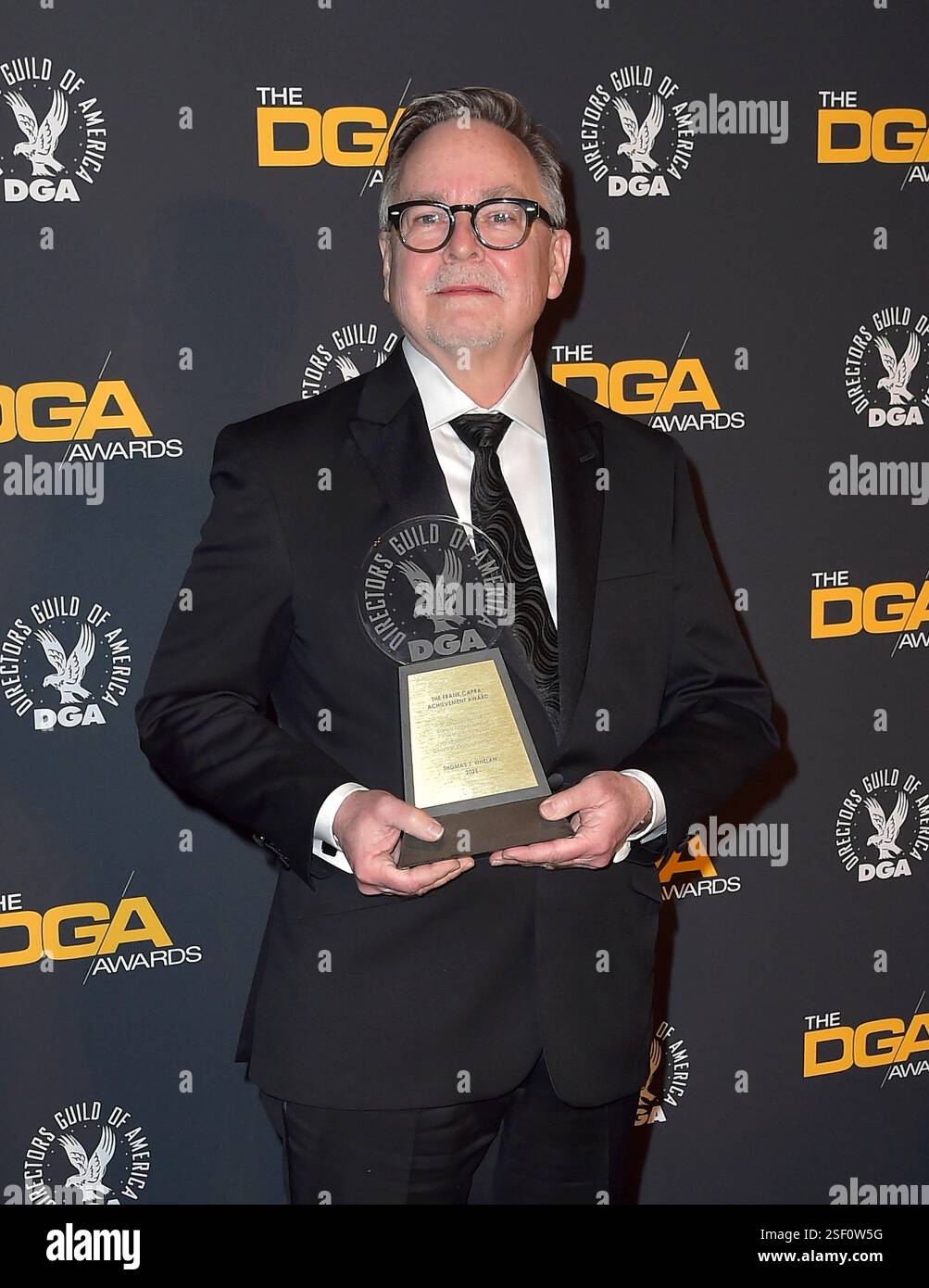 Beverly Hills, USA. 08th Feb, 2025. Thomas J. Whelan in the press room at the 77th Annual DGA ...