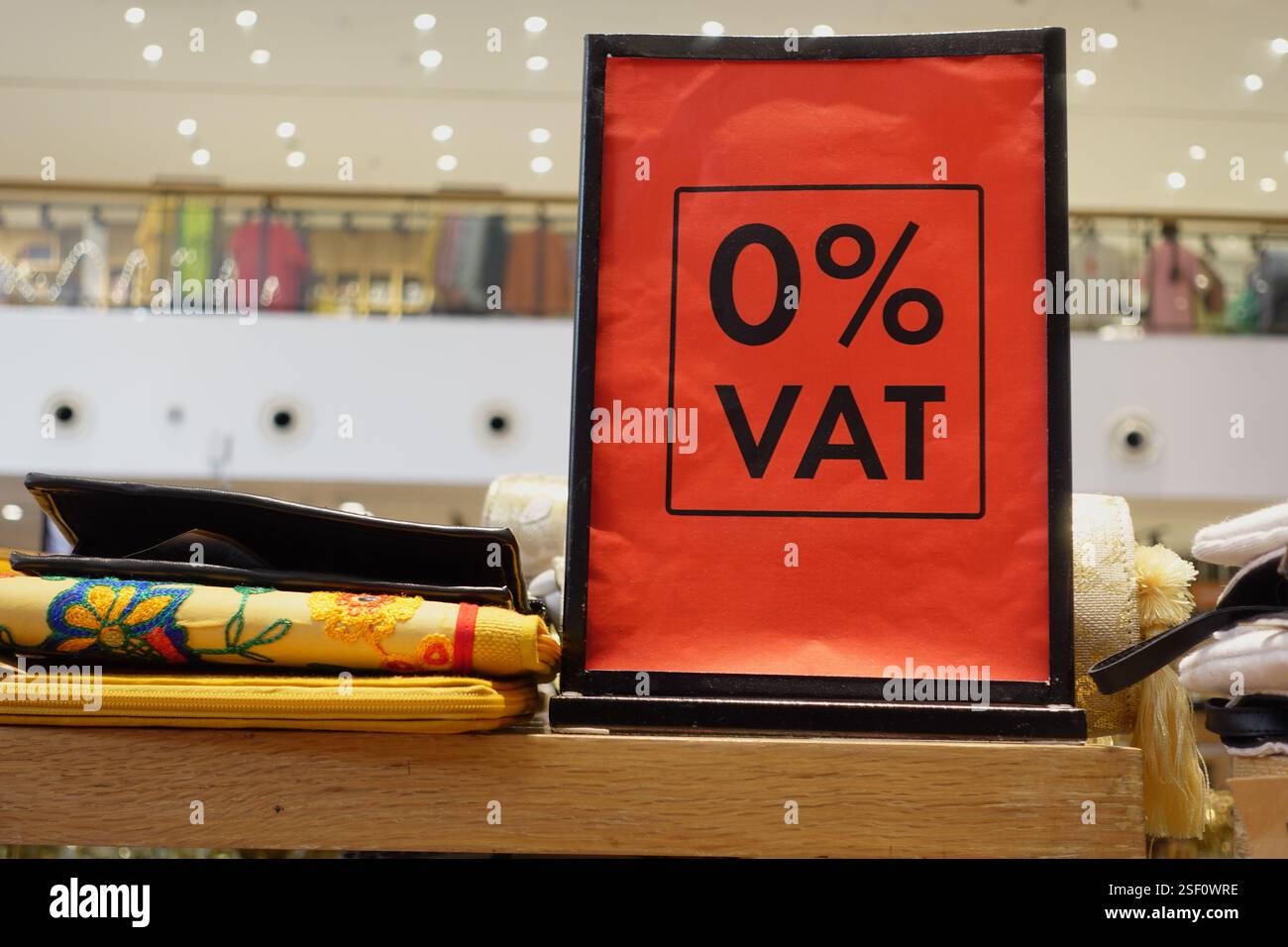 Bright red sign indicates zero value-added tax for products available ...