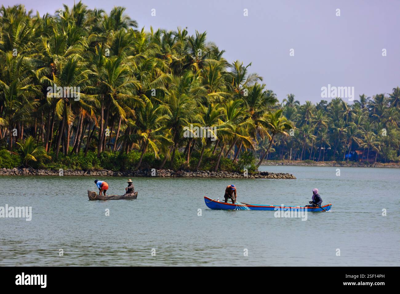 Small fishing boats on the Thejaswini River in Nileshwar - Kerala State ...