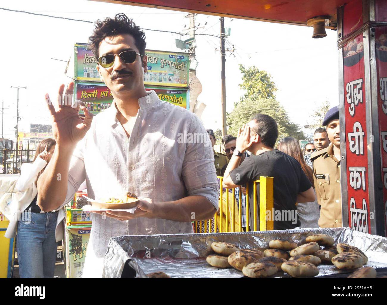 PATNA, INDIA - FEBRUARY 8: Bollywood actor Vicky Kaushal eats Bihar ...
