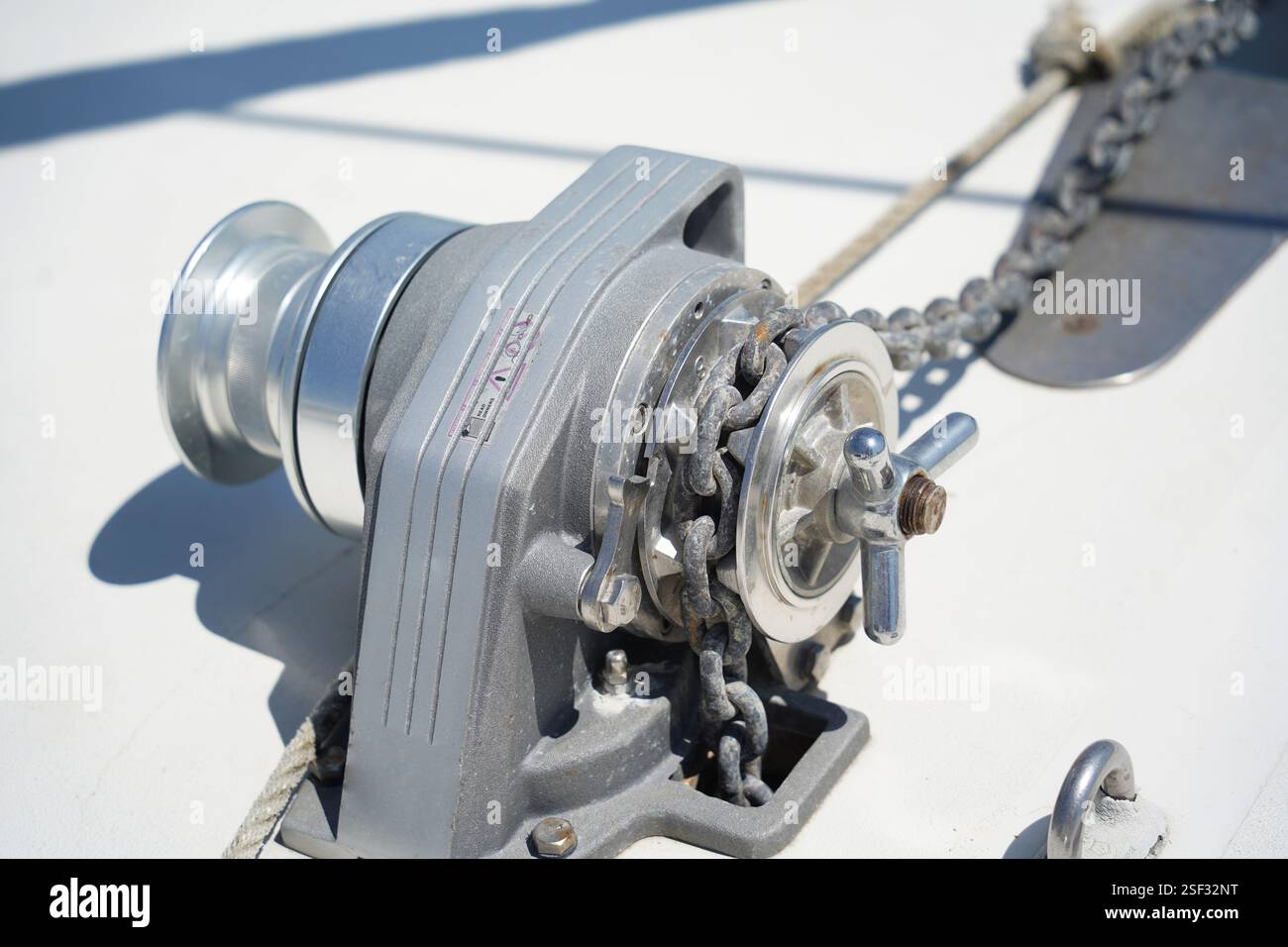 Anchor winch with sturdy chain on a voyage boat, ensuring stability and ...