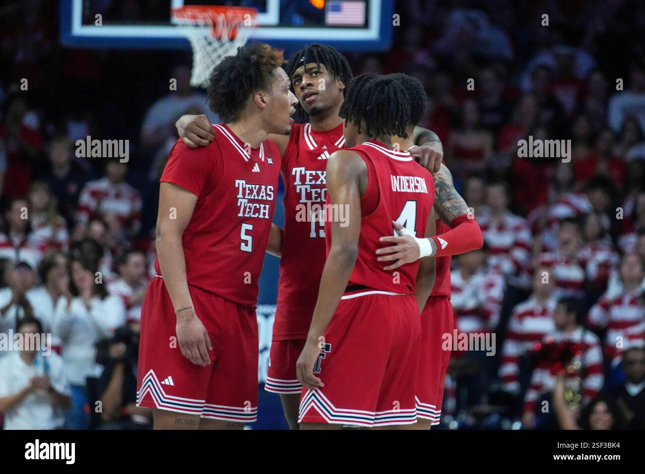 Texas Tech forward Darrion Williams (5) JT Toppin (15) and Christian ...