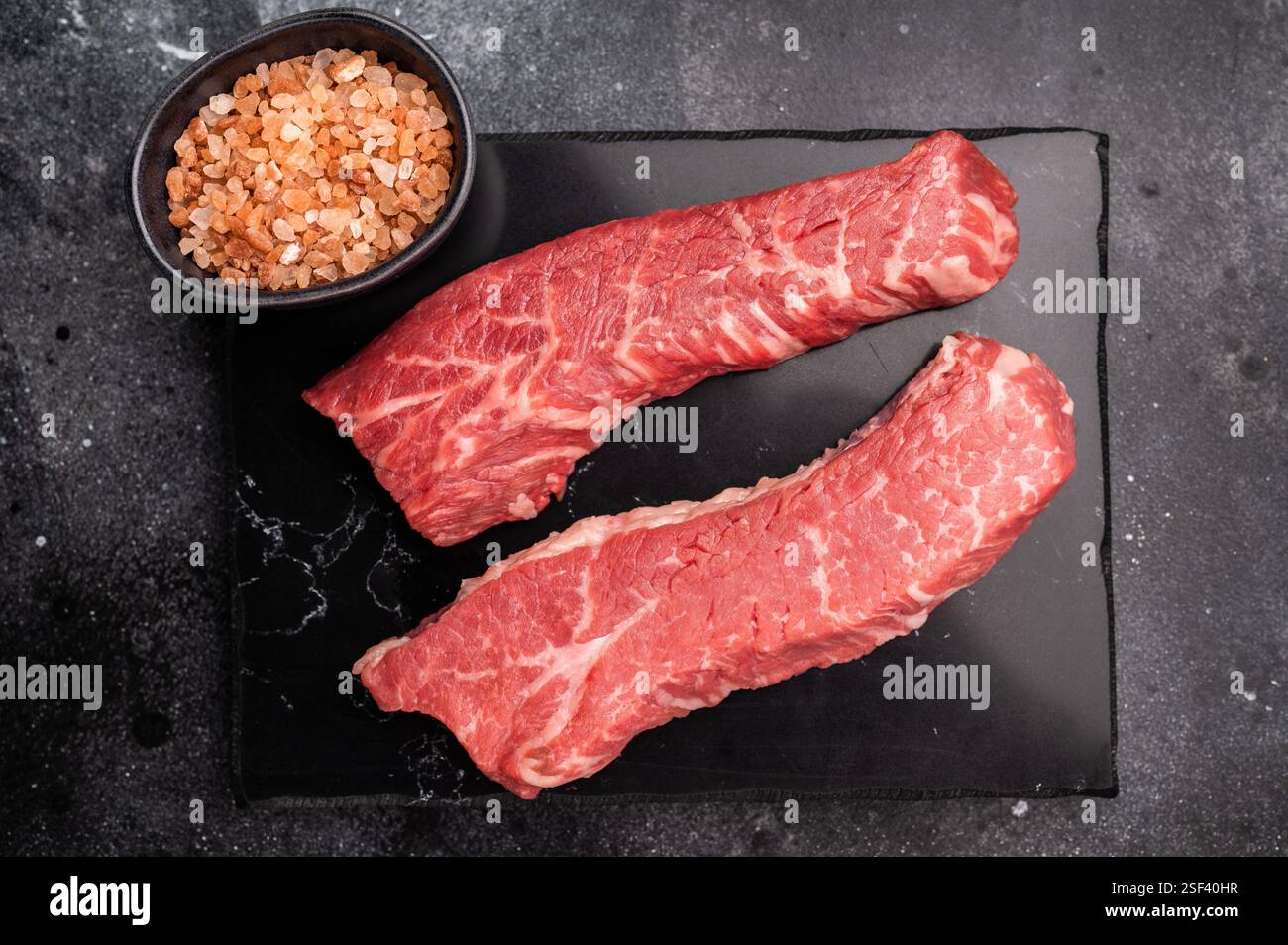Raw Tri Tip Steak from Black Angus beef meat . black background. top ...