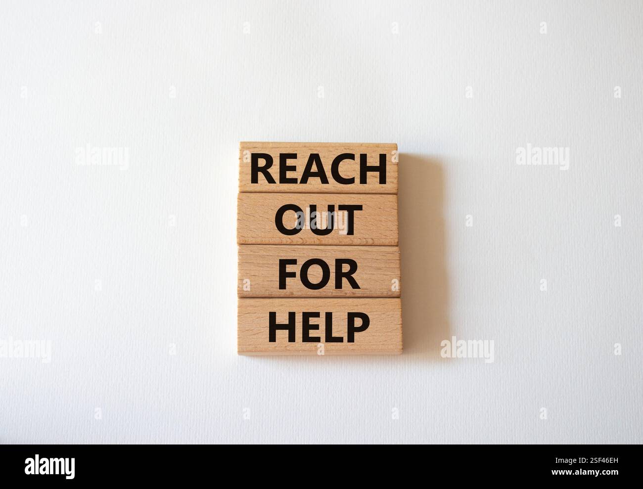 Reach out for help symbol. Wooden blocks with words Reach out for help ...