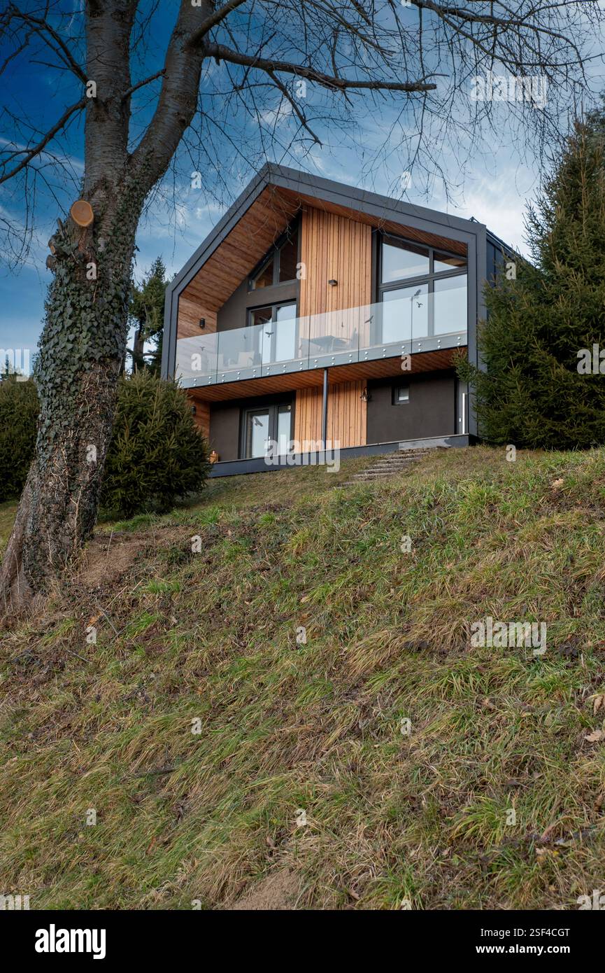 New modern house exterior with contemporary features. Luxury home ...