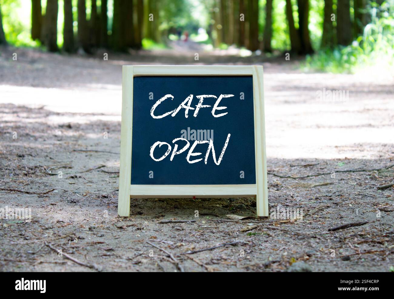Cafe Open symbol. Blackboard with words Cafe Open. Beautiful forest ...