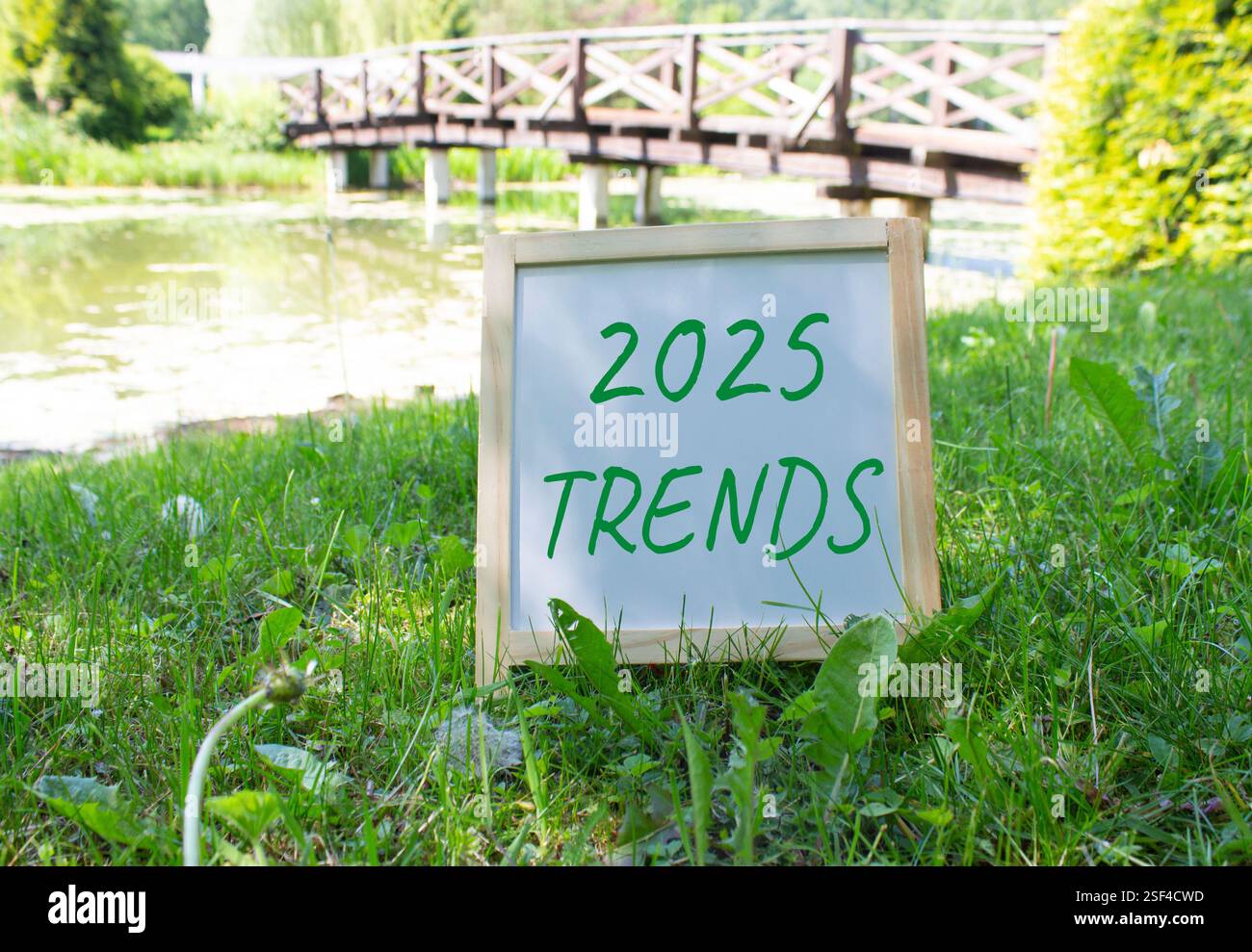 2025 Trends symbol. White Blackboard with words 2025 Trends. Beautiful ...