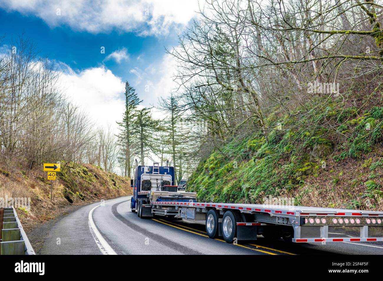 Industrial blue big rig long haul semi truck with extended cab for ...
