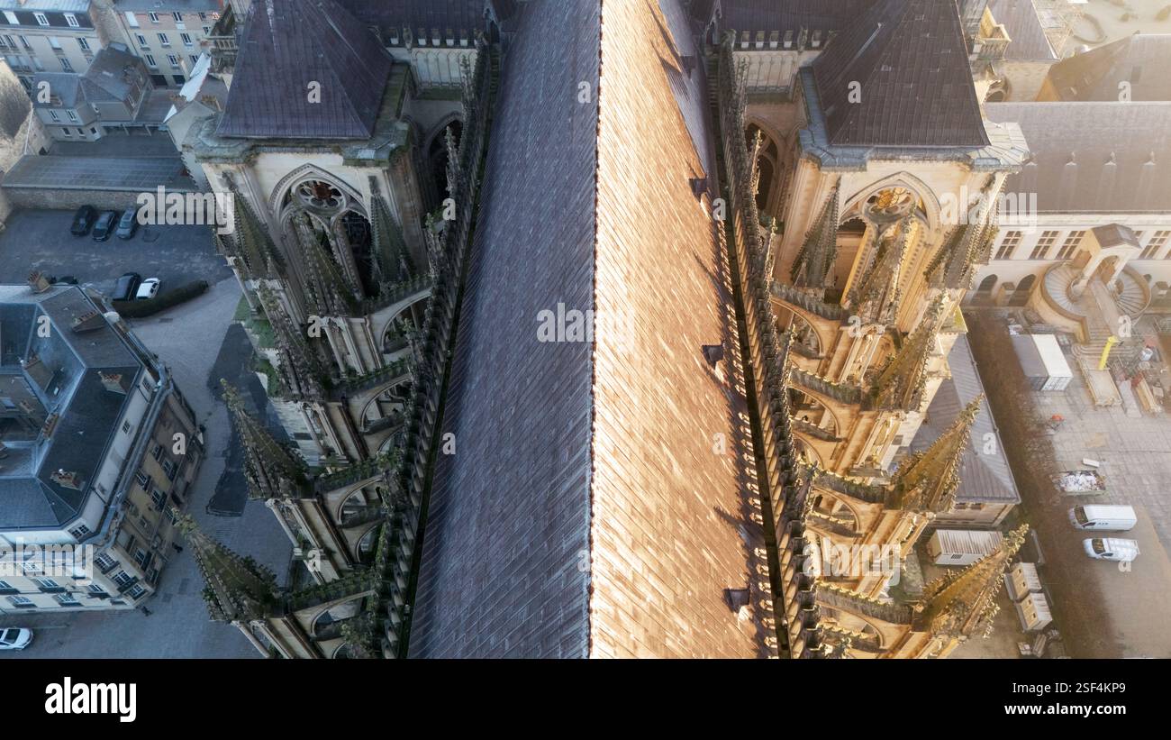 High-angle view of Reims Cathedral's steep roof and intricate Gothic ...