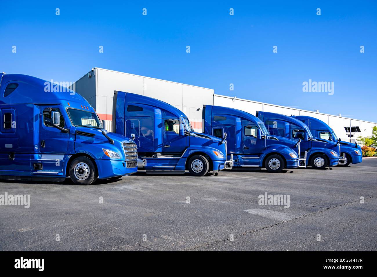 Industrial powerful bright blue big rig semi truck tractors without ...